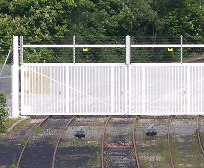 Large automatic hinged swing gates for power station | Frontier Pitts