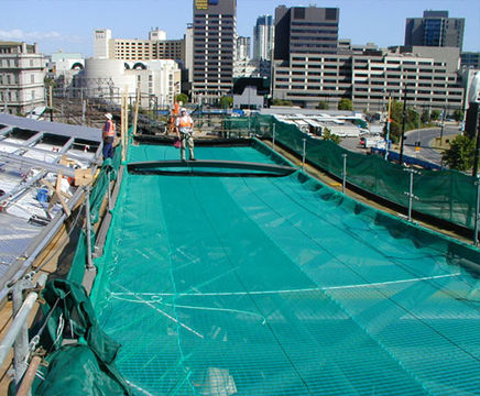 45mm mesh fall arrest safety net with debris overlay | Huck Play