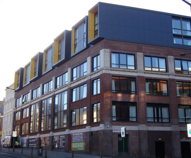 Modern through-coloured cladding for traditional facade | Cembrit