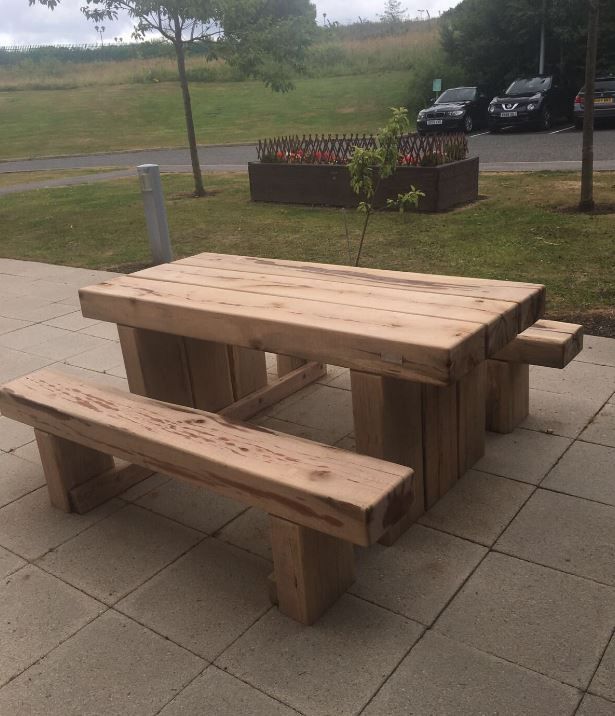 Robust green oak picnic suites for Nike's UK head office | Images