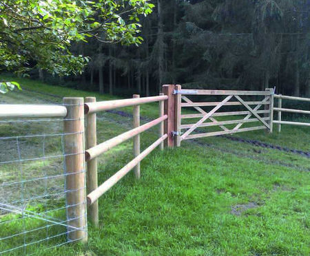 Estate fencing - machine round posts | AVS Fencing & Landscaping ...