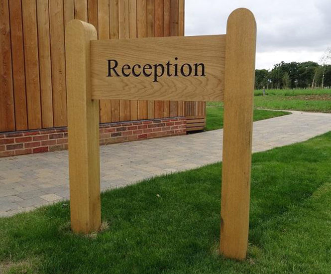 Woodsman™ oak badging sign | Fitzpatrick Woolmer