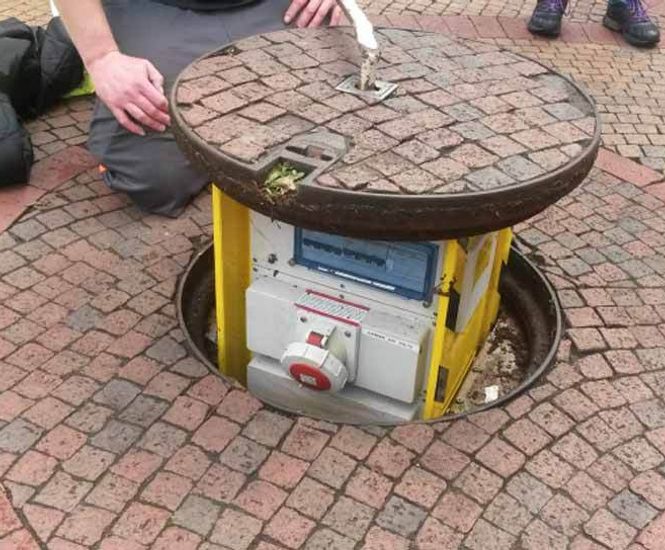 Retractable service units for historic open market | Pop Up Power Supplies