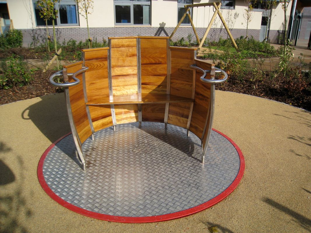 Images for Timber Barrel Roundabout for accessible play